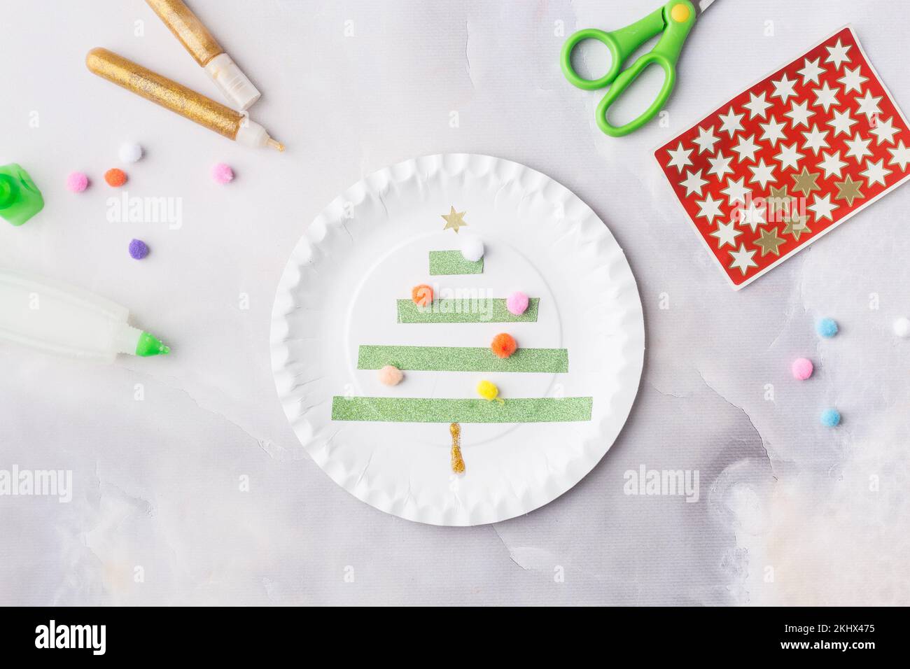 The child makes a greeting card Christmas paper collage. Made with his ...