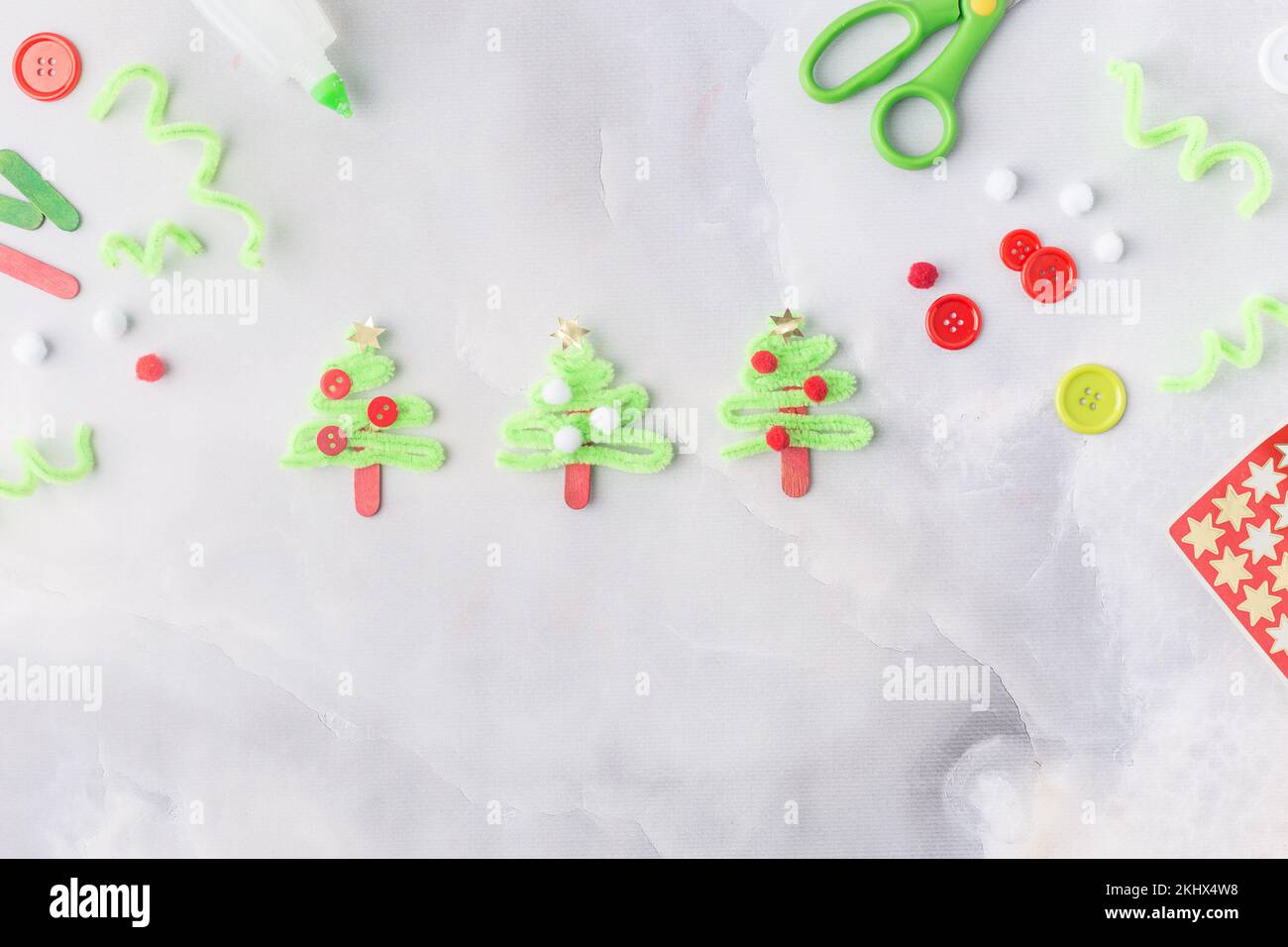 The child makes a greeting card Christmas paper collage. Made with his ...