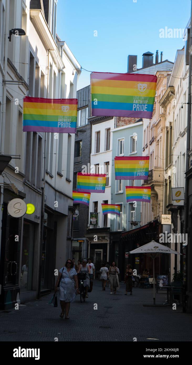 A vertical shot of a street with beautiful buildings with the pride ...