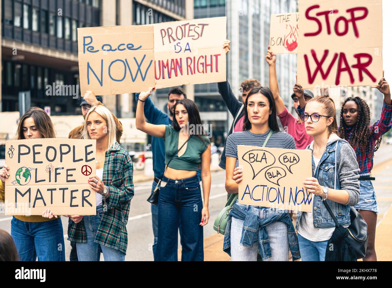 protests against war, pacifist movement in the streets, banner with ...