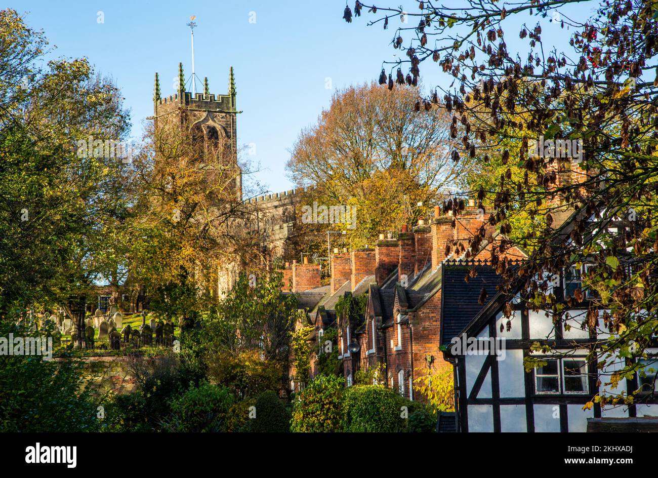 Front Street and St Mary's parish church and churchyard during Autumn ...