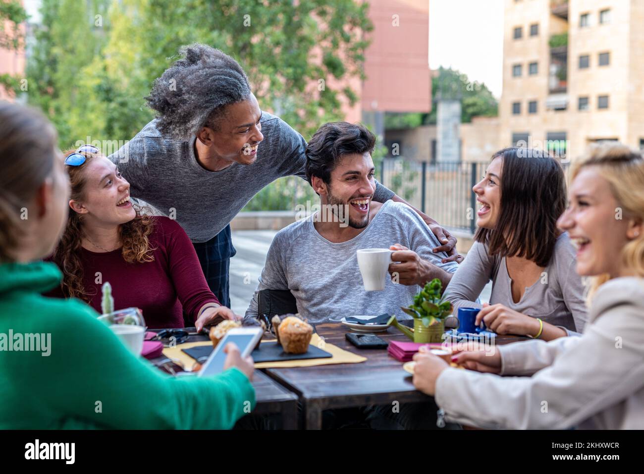 Group eating biscuits outdoors hi-res stock photography and images - Alamy