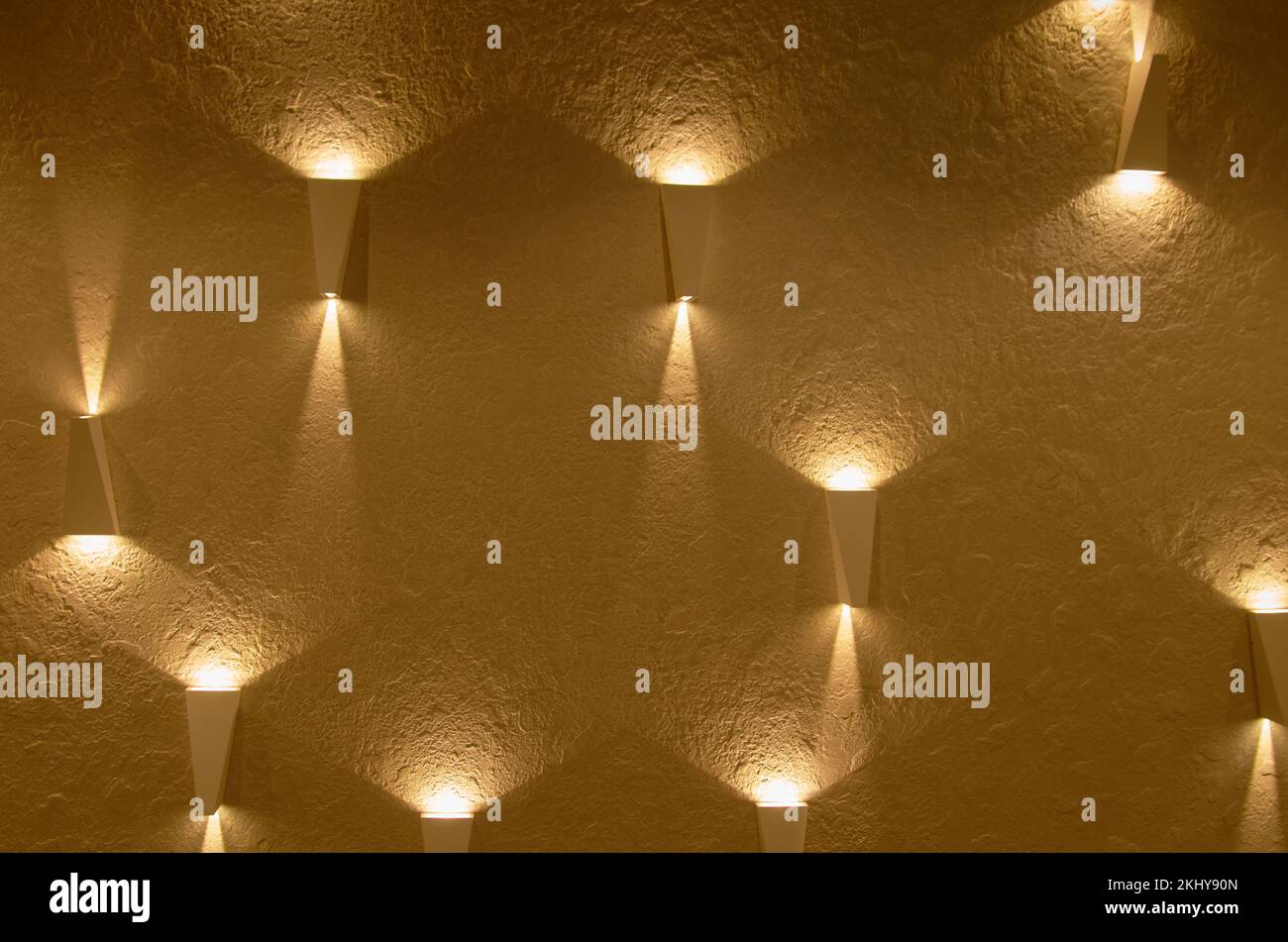 Abstract background — yellow wall with electric lamps Stock Photo - Alamy