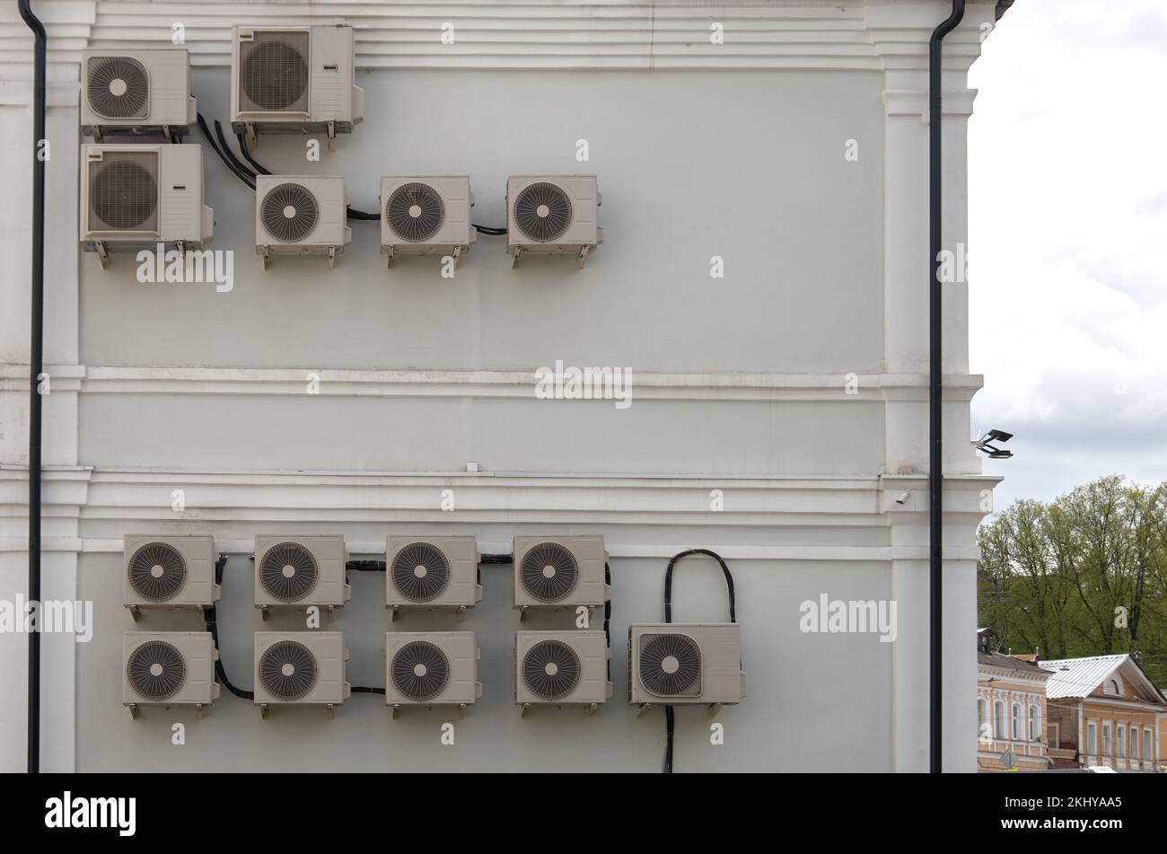 Too many air conditioners hanging on the wall of the building Stock ...