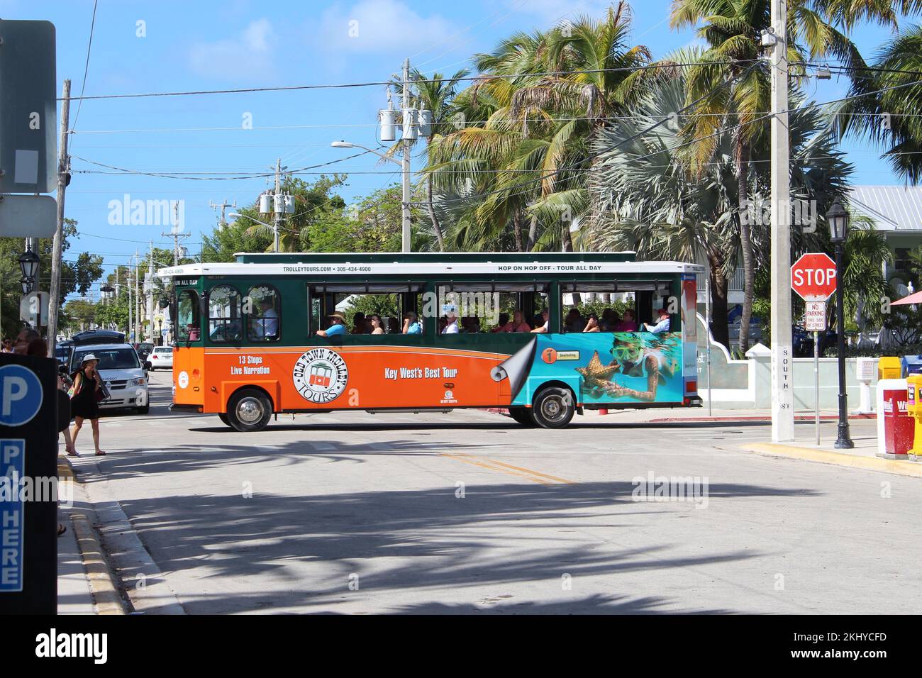 A bus on the road carrying tourists in Key West, Florida Stock Photo ...