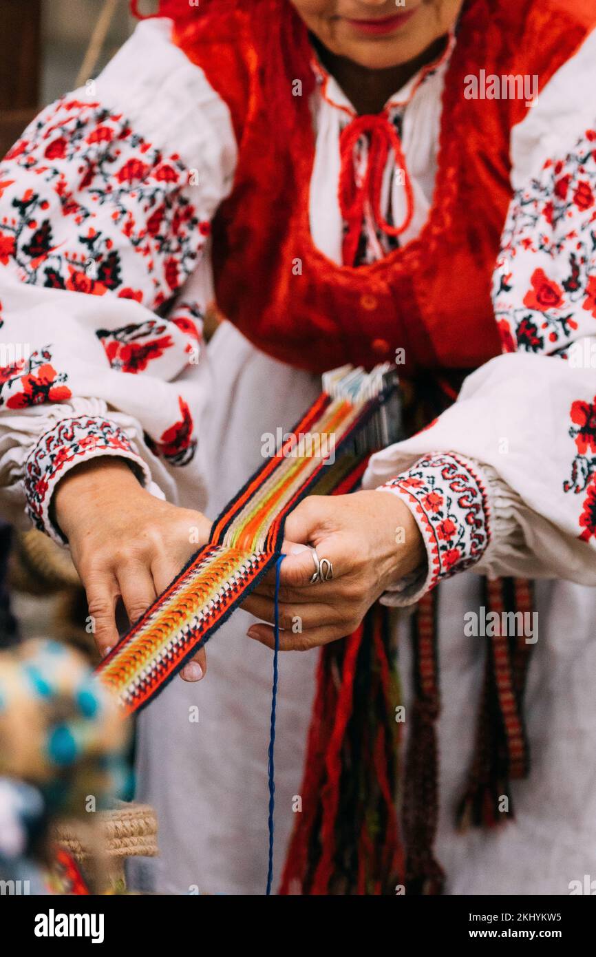 Close-up Of Adult Female Weaver In Traditional Embroidered Belarusian ...