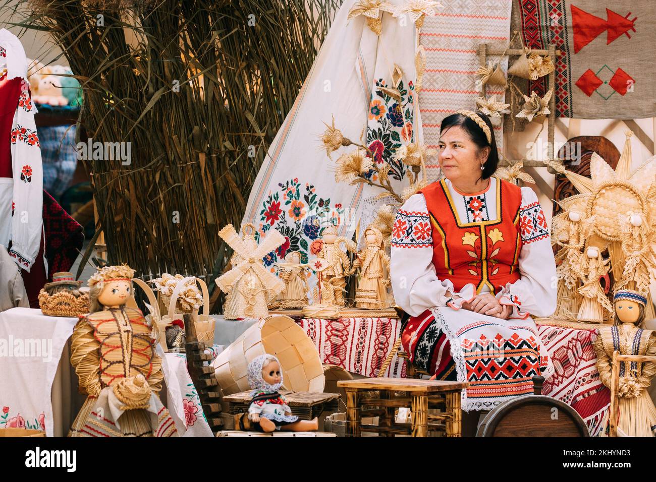 Elderly Female Weaver In Traditional Embroidered Belarusian Clothes ...