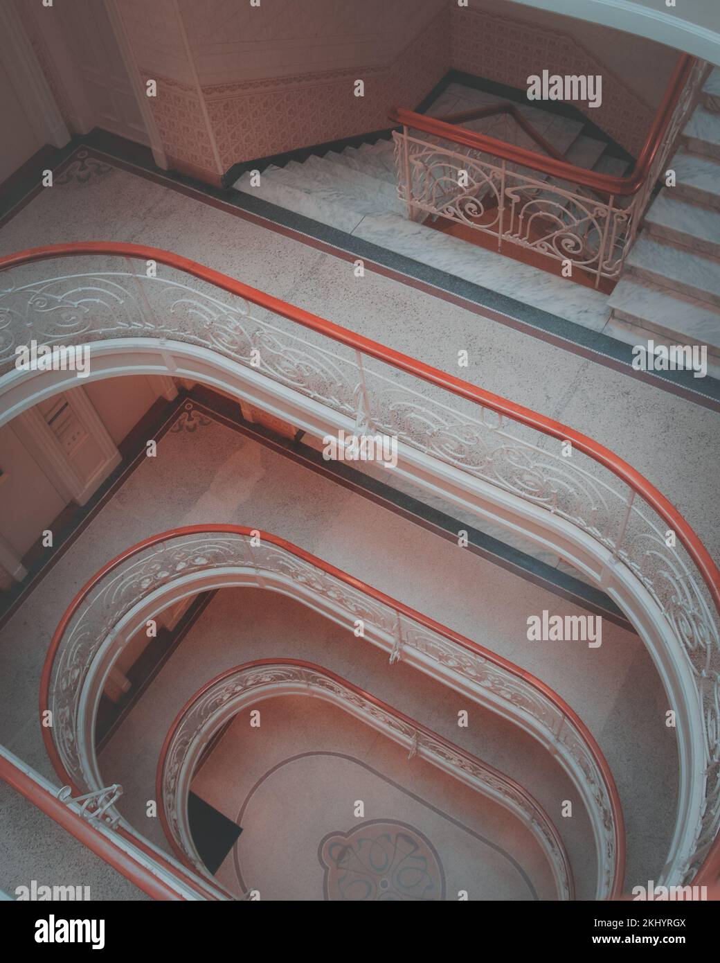 An aerial vertical view of a beautifully painted halls on each floor on ...