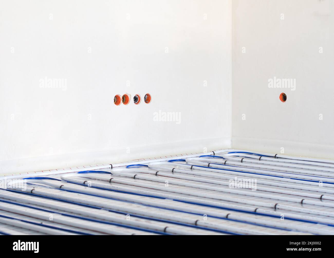 Heating posed in a under construction building Stock Photo - Alamy