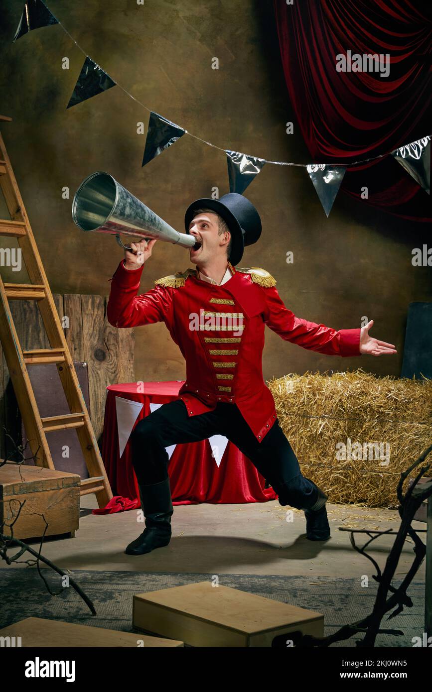 Illusionist or showman. Cinematic portrait of emotive man retro circus ...