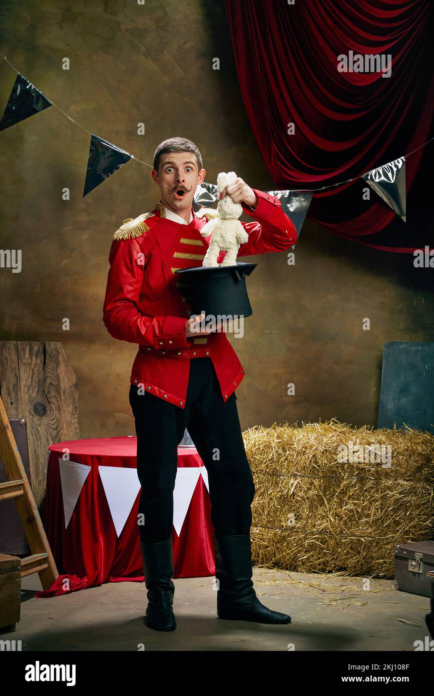 Magician. Vintage portrait of male retro circus entertainer expresses ...