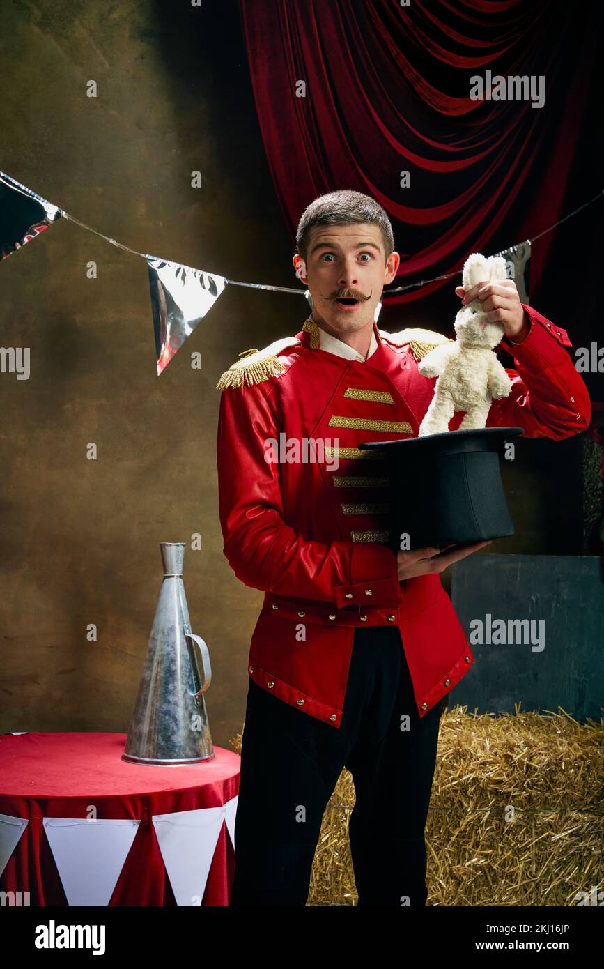 Magician. Vintage portrait of male retro circus entertainer expresses ...