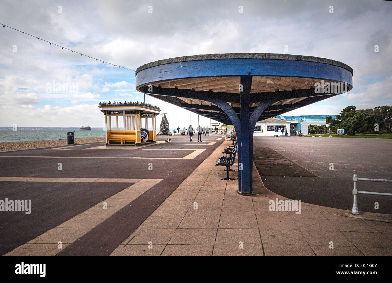 Seating along Southsea seaside promenade with shelter from the elements ...