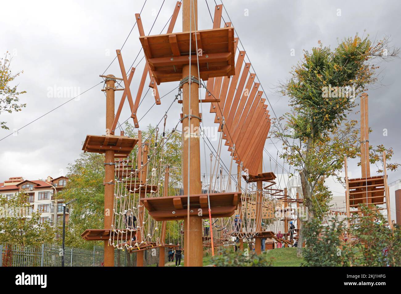 An obstacle course for children and teenagers in an adventure park ...