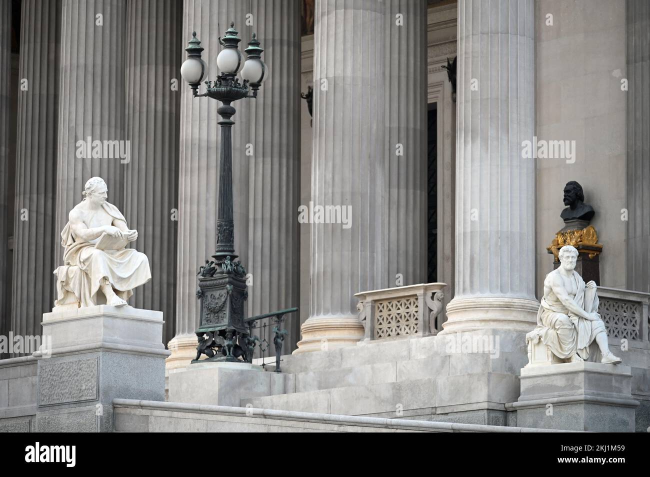 Two statues in front of the Austrian parliament in Vienna Austria Stock ...