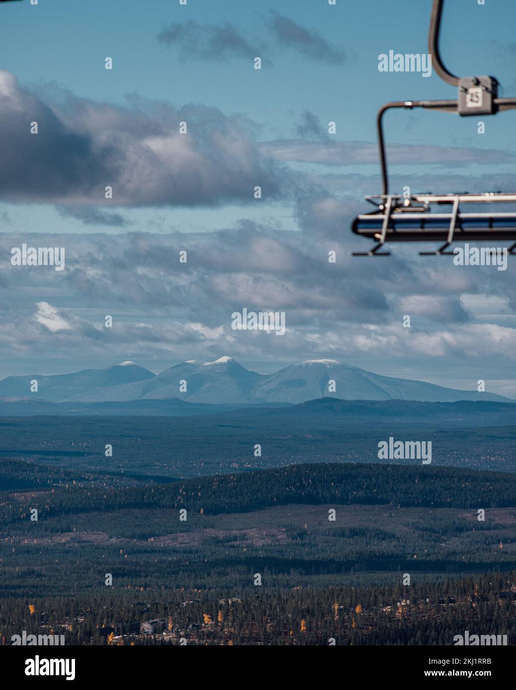 big mountain with snow on top and chairlift Stock Photo - Alamy
