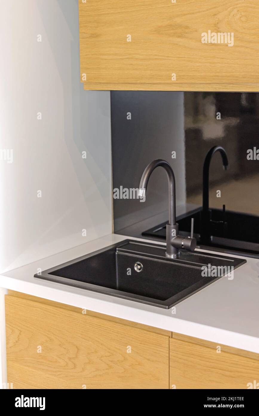 All Black Sink Faucet and Backsplash Dark Style in Modern Kitchen Stock ...