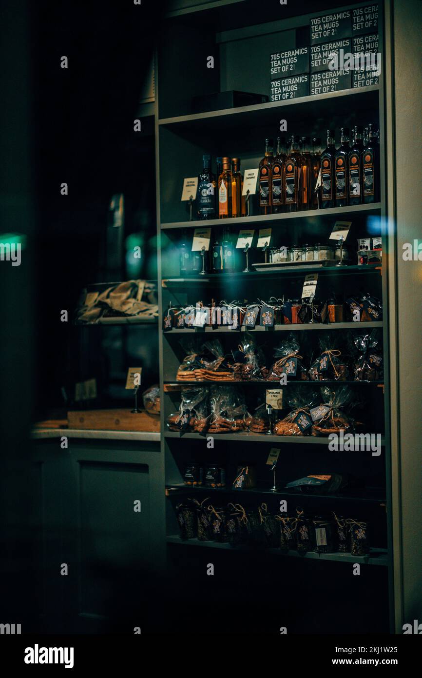 coffee shop at night seen from the window outside Stock Photo - Alamy