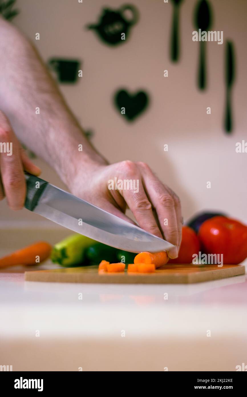 Cutting carrot knife closeup hi-res stock photography and images - Alamy