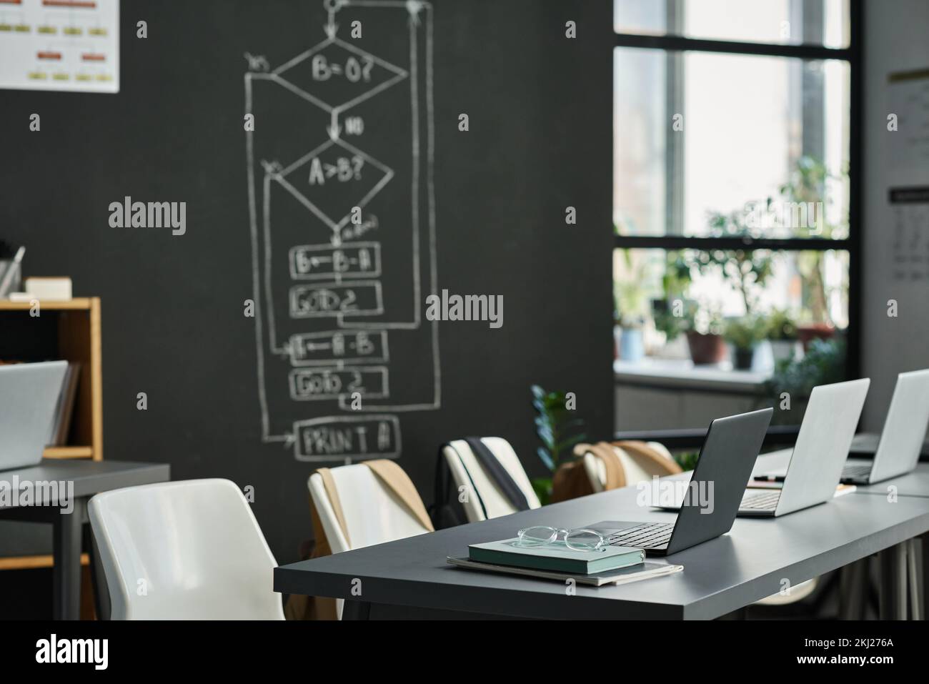 Horizontal image of modern classroom of IT technology with computers on ...