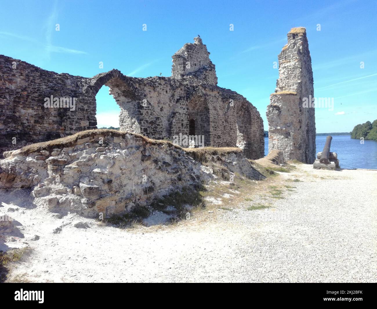 A beautiful scenery of the Ruins of Koknese Castle under the blue sky ...