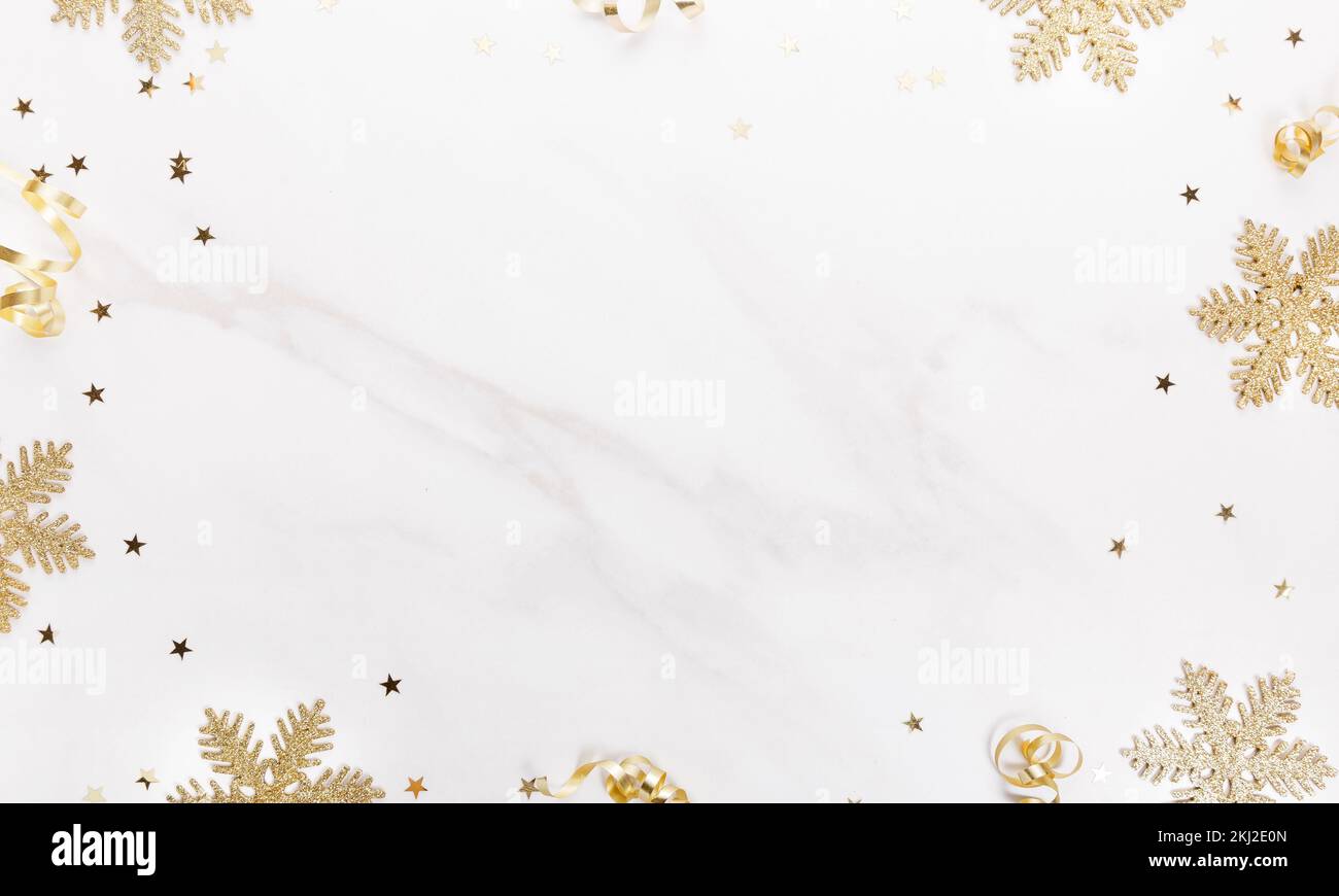 Christmas decorations in gold colors on white background. Gift, holiday ...