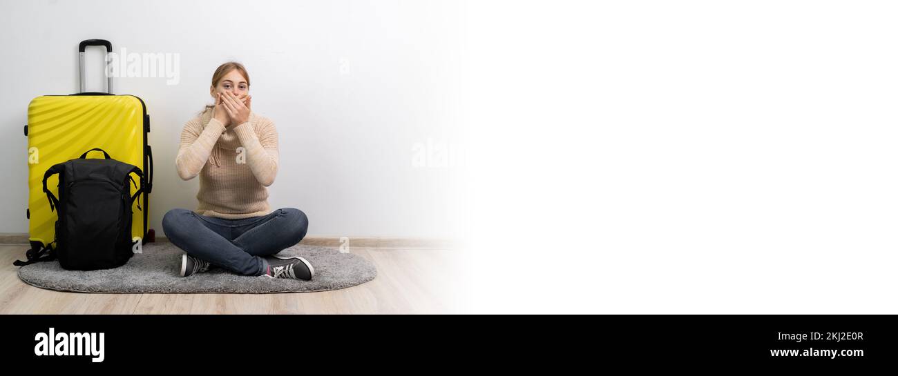 Woman traveler with suitcase in sweater ready to go to travel feeling ...