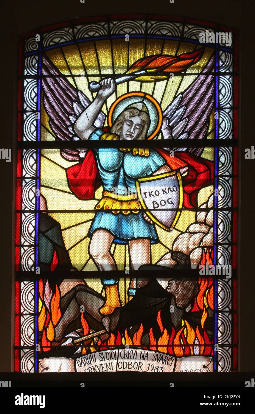 St. Michael the Archangel, stained glass window in the parish church of ...