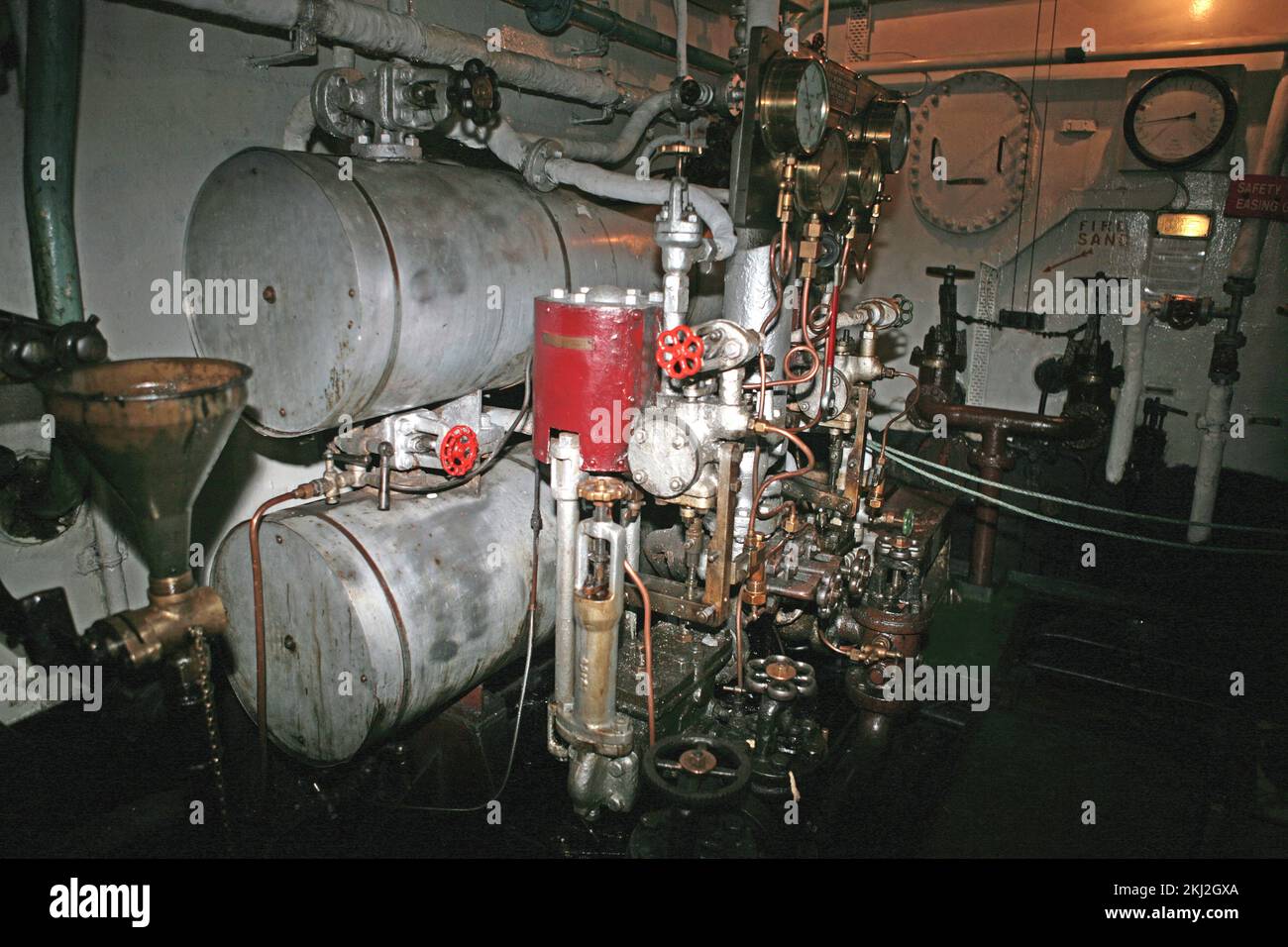 The boiler room, showing the auxiliary boiler on the preserved ...