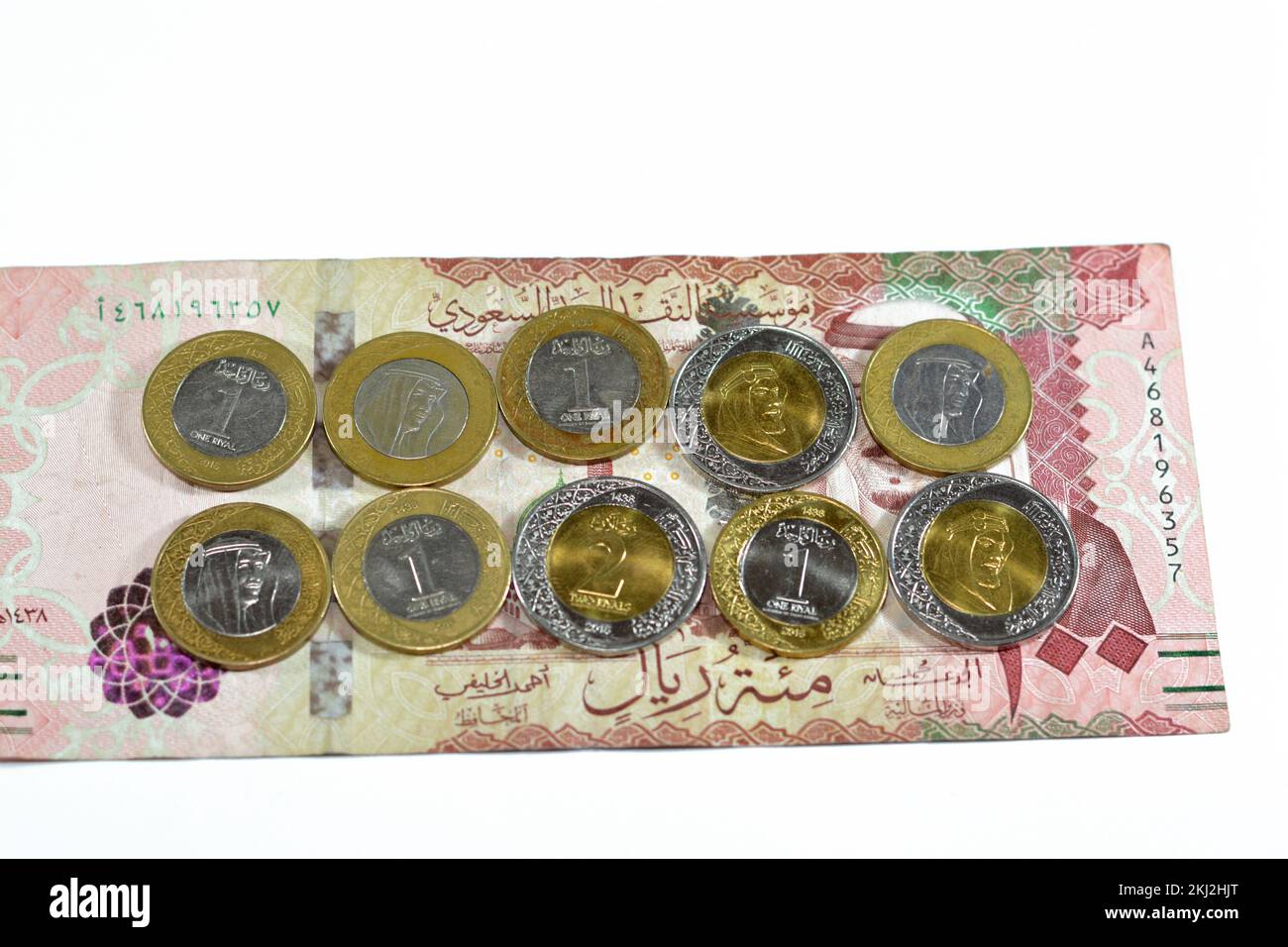 100 SAR one hundred Saudi Arabia riyals cash money banknote with pile ...