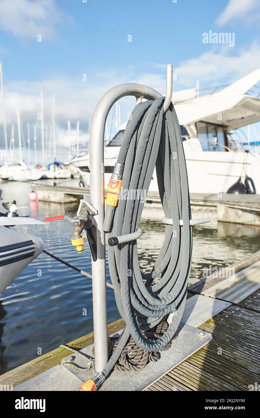 Water supply hose to the boat is wound on a spool. Refueling the boat ...