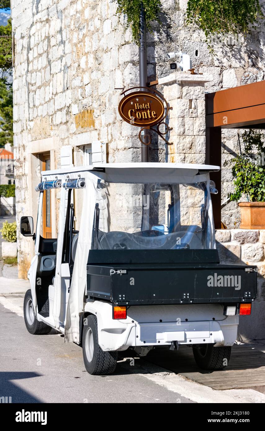 Close up transportation buggy outside Hotel Conte, Perast, Montenegro ...