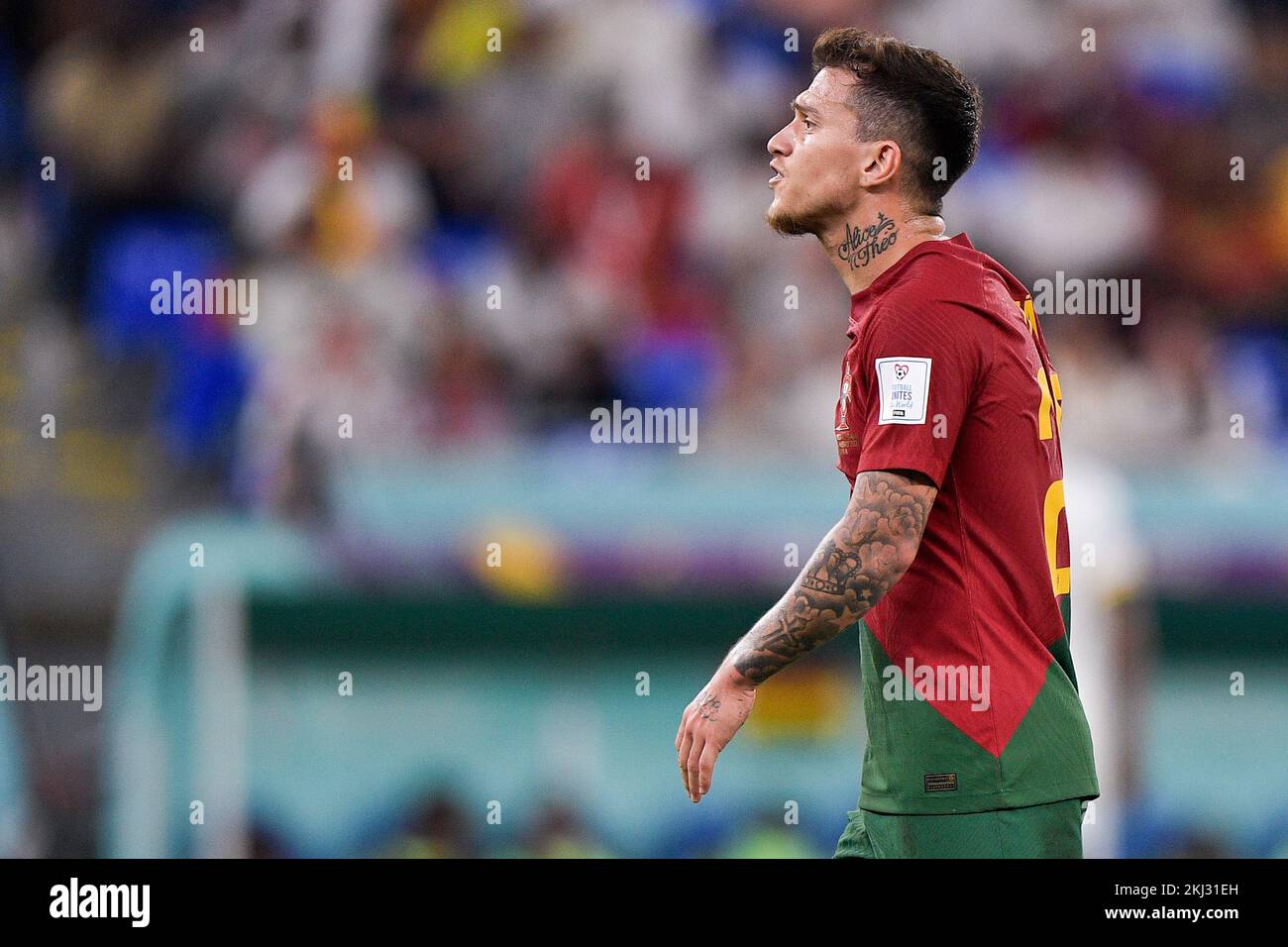 DOHA, QATAR - NOVEMBER 24: Otavio of Portugal talks to his teammates ...
