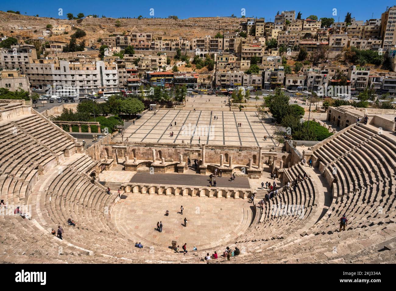 Panoramic view of Amman Roman Amphitheater with the city in the ...