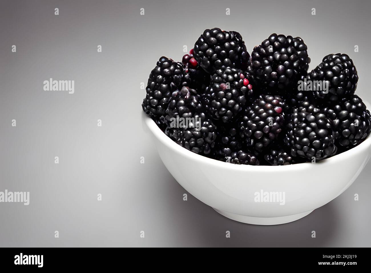 The blackberries inside a white plate Stock Photo - Alamy