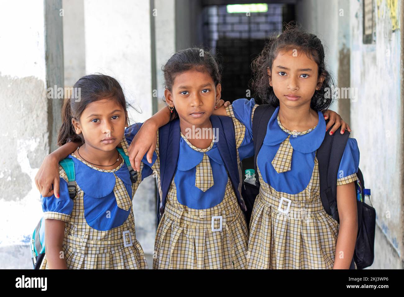 Group of School Girls with backpack standing front of camera Stock ...