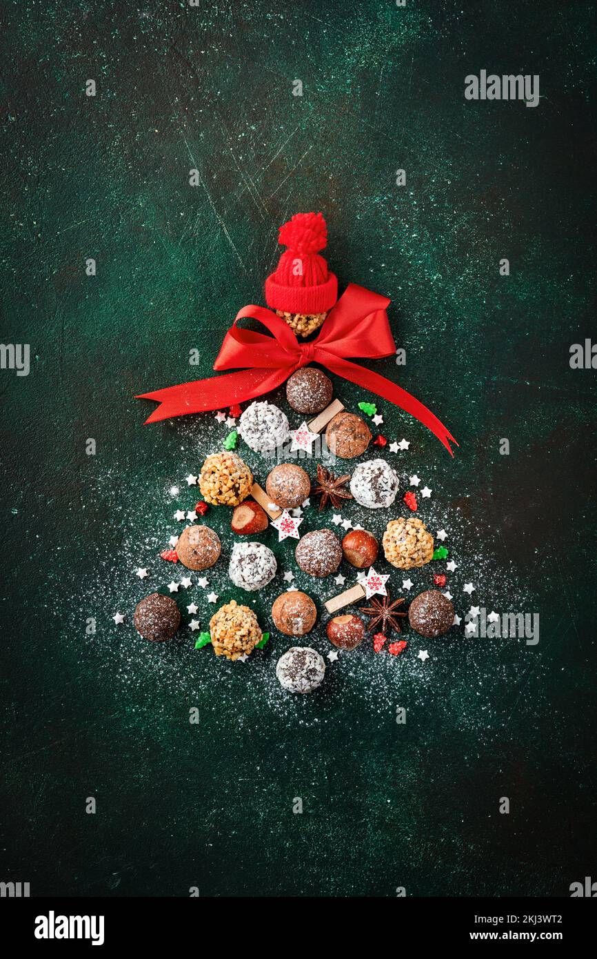 Christmas tree made of chocolate truffles, hazelnuts, anise stars ...