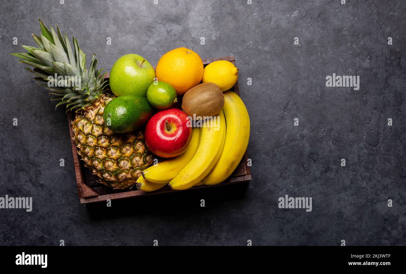 Wooden box full of healthy fruits food. Flat lay with copy space Stock ...