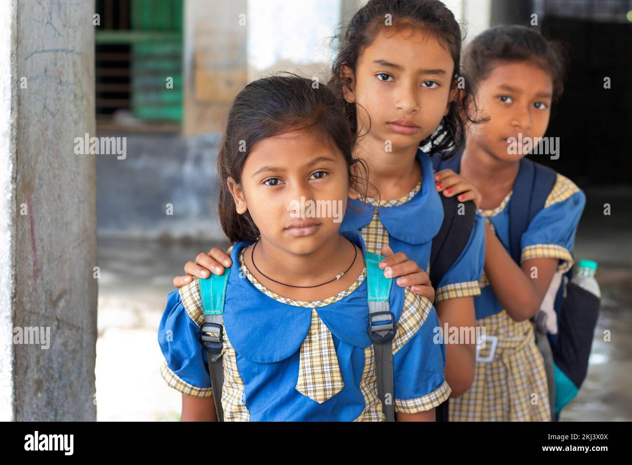 Group of School Girls with backpack standing front of camera Stock ...