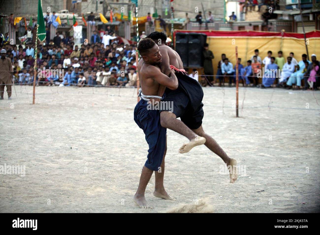 Wrestlers in action during the Sindh traditional wrestling Malh on the ...