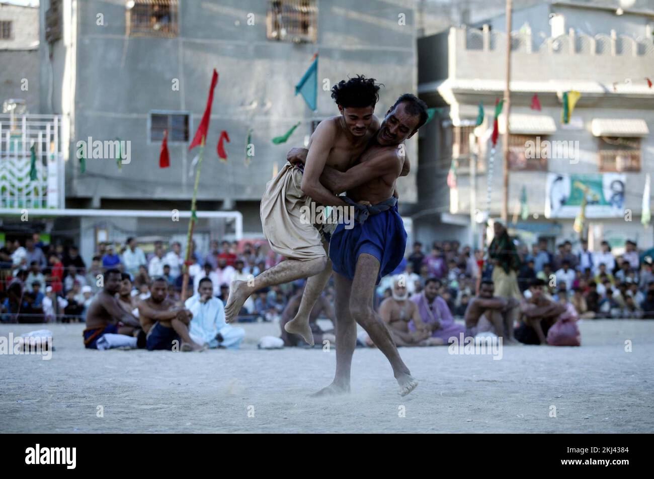 Wrestlers in action during the Sindh traditional wrestling Malh on the ...
