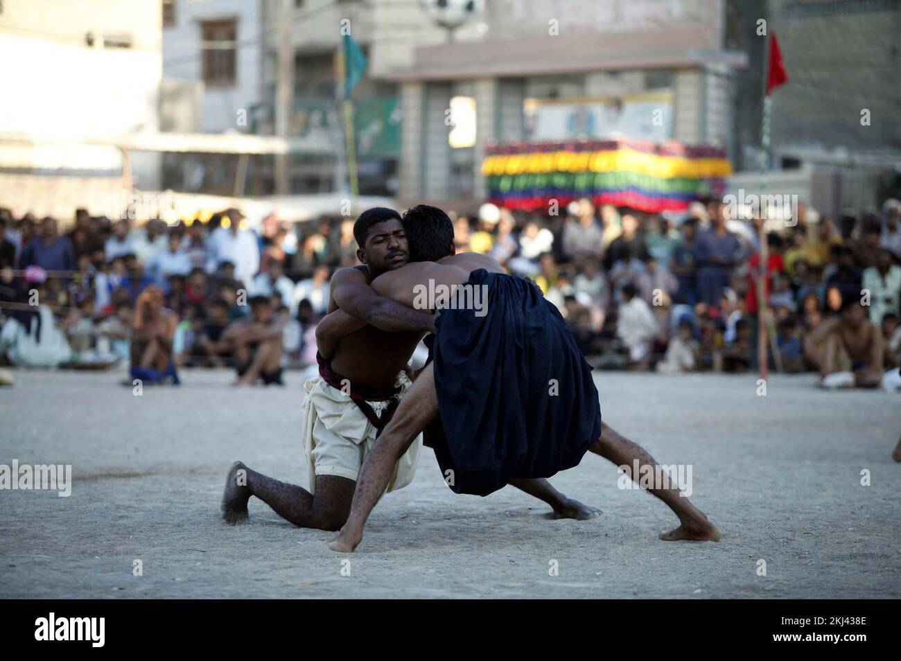 Wrestlers in action during the Sindh traditional wrestling Malh on the ...