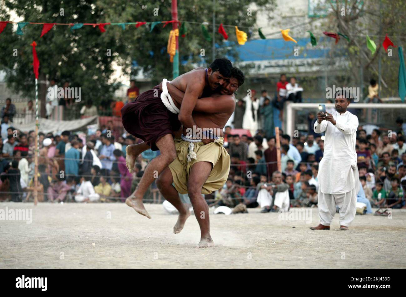 Wrestlers in action during the Sindh traditional wrestling Malh on the ...