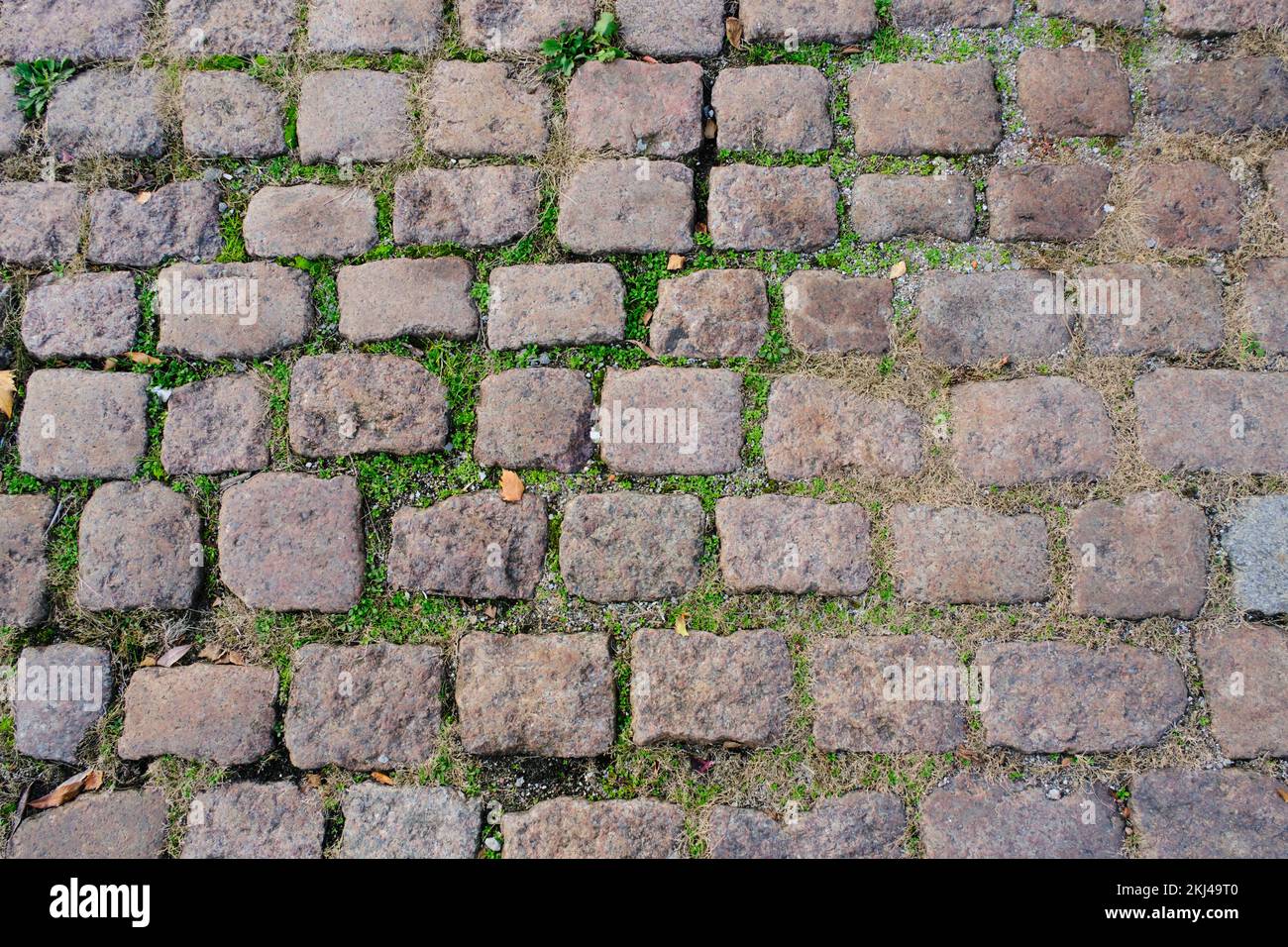 Old stone paving stones, road surface Stock Photo - Alamy