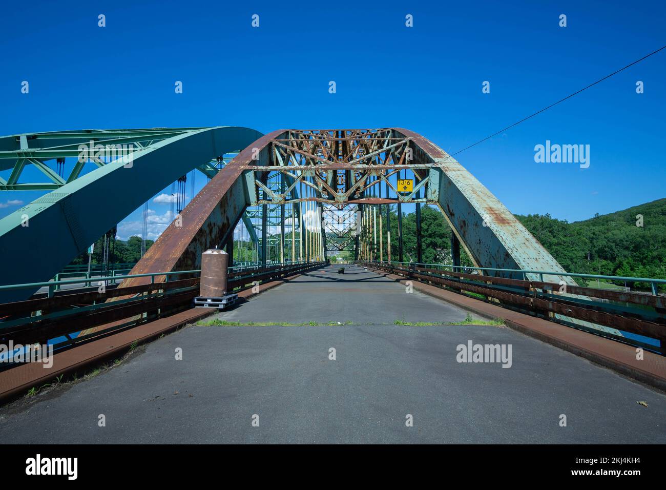 The Justice Harlan Fiske Stone Bridge shines in the sun on a hot June ...
