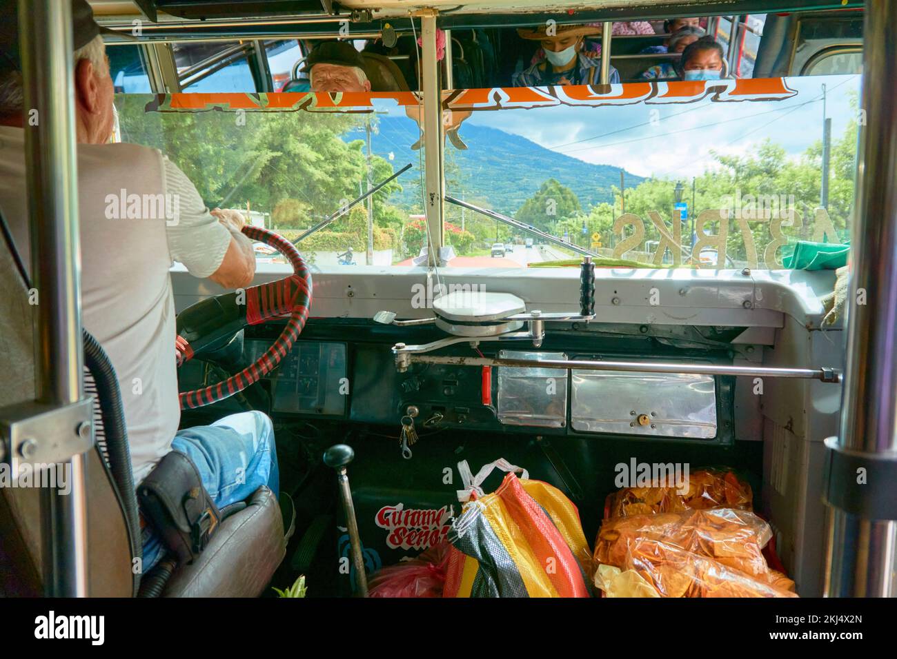 A driver seat view of Guatemalan chicken bus Stock Photo - Alamy
