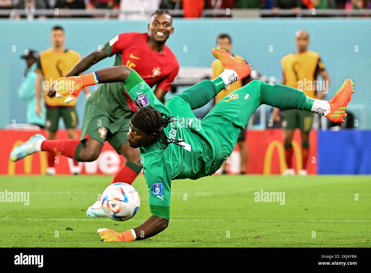 Doha, Qatar. 24th Nov, 2022. Rafael Leao (L) of Portugal shoots to score during the Group H ...