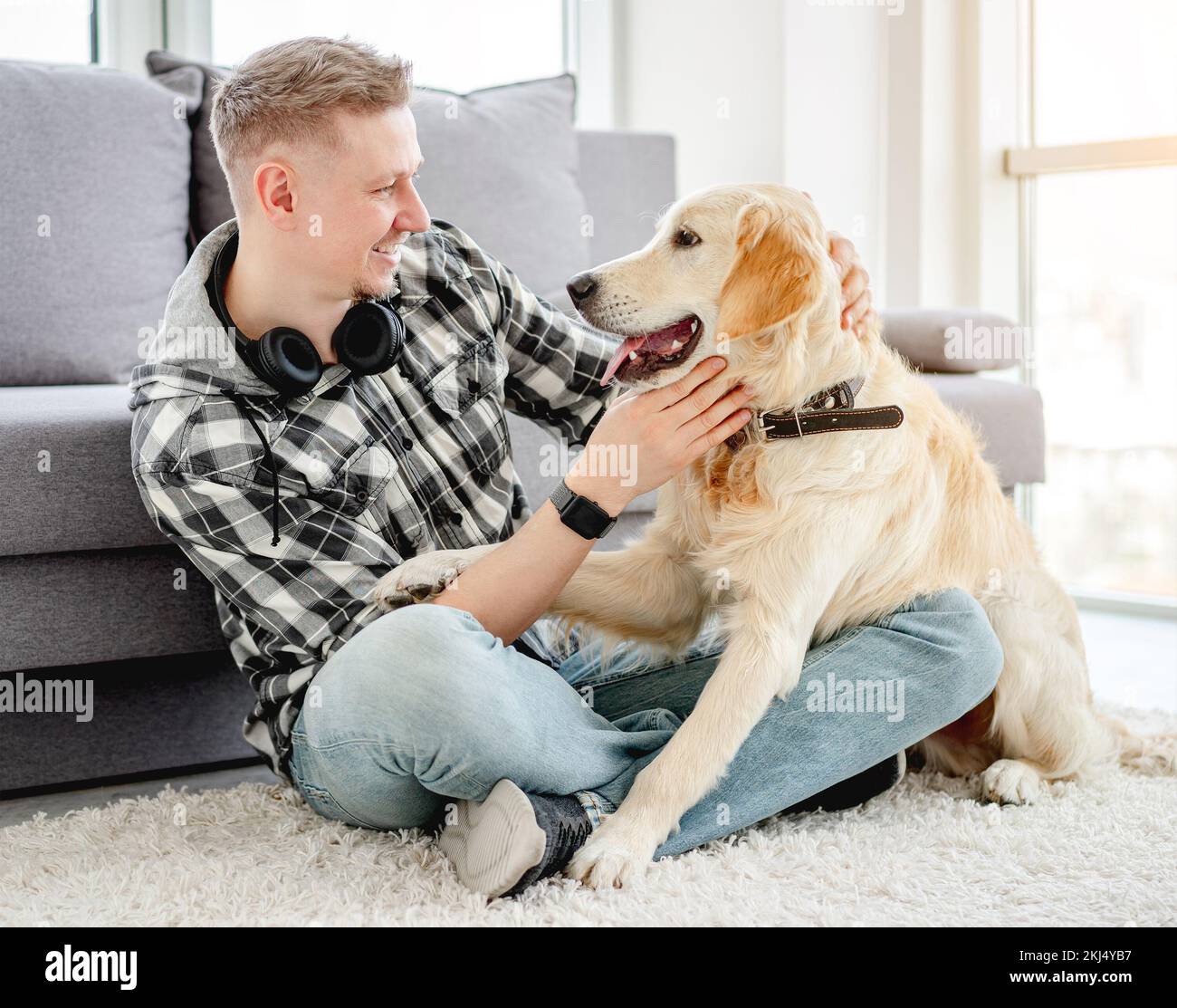 Man and dog in golden light hi-res stock photography and images - Alamy
