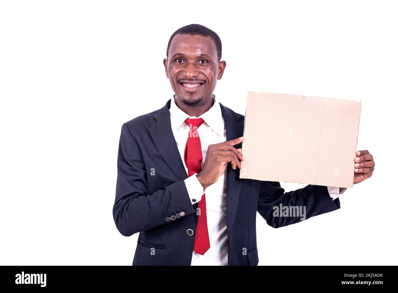 a businessman standing on white background presenting an empty paper ...