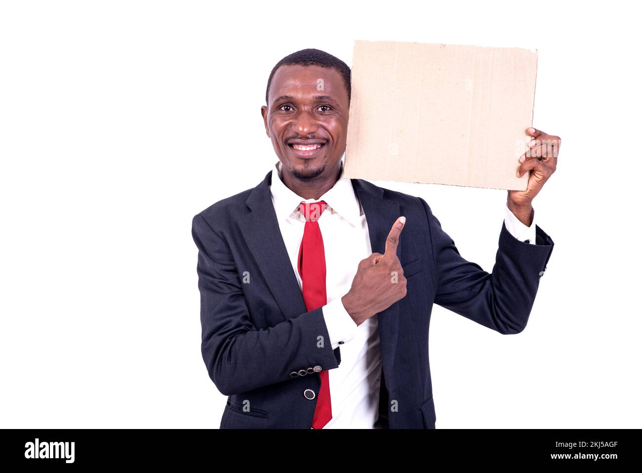 a businessman standing on white background presenting an empty paper ...